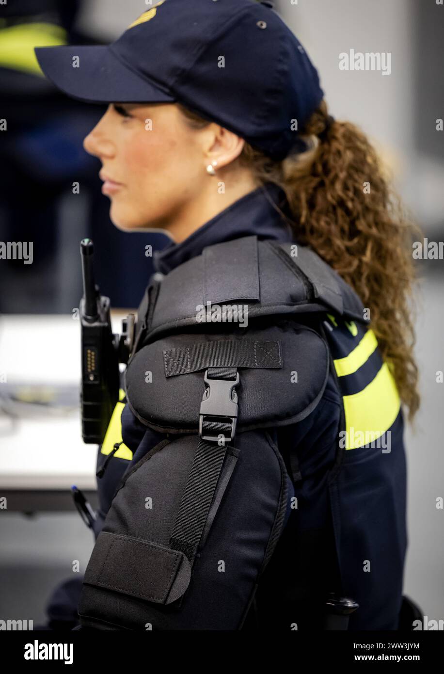 OSSENDRECHT - Police officers try on the new uniform during the ...