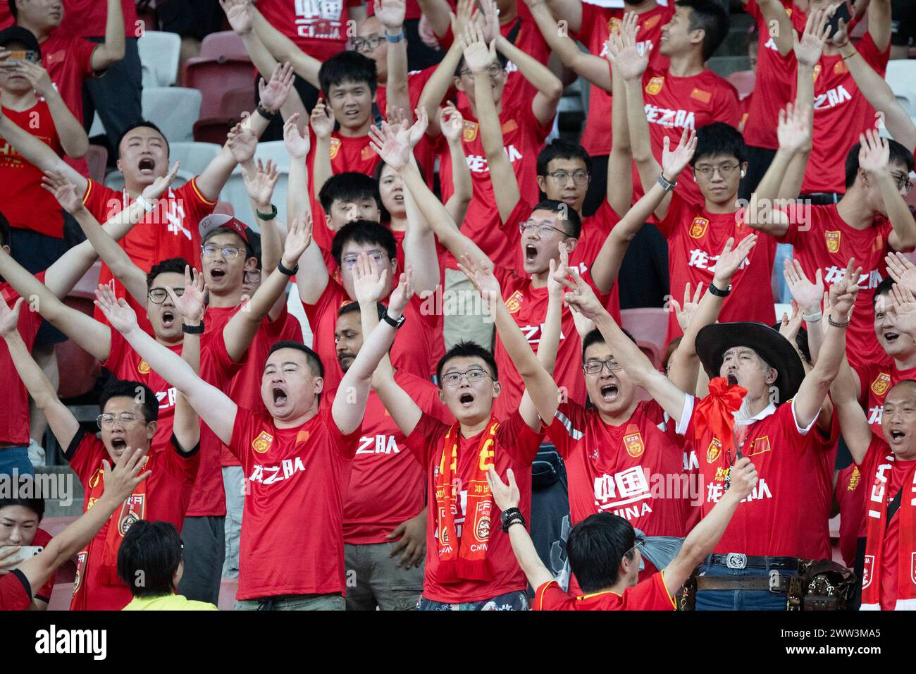 Singapore. 21st Mar, 2024. Supporters of team China cheer for the team ...