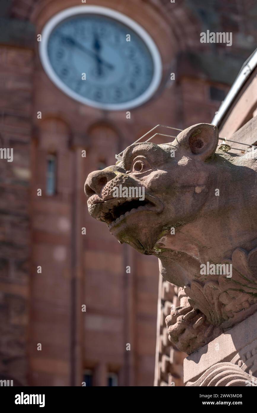 Gargoyle, demonic animal figure on the pavilion, clock from the clock ...