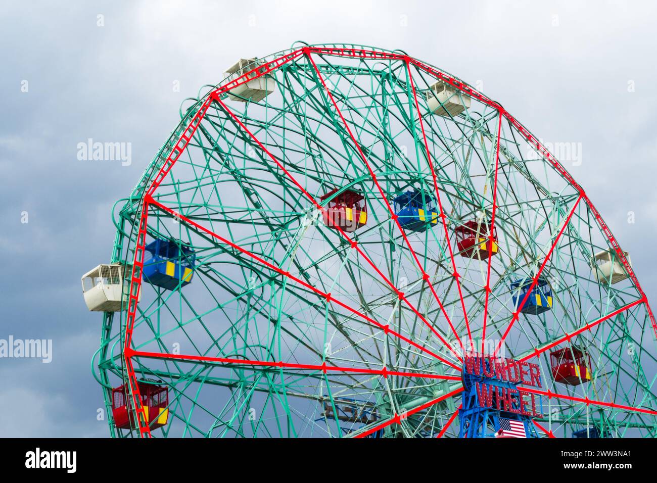 The iconic Wonder Wheel ferris wheel with colorful gondolas against a ...