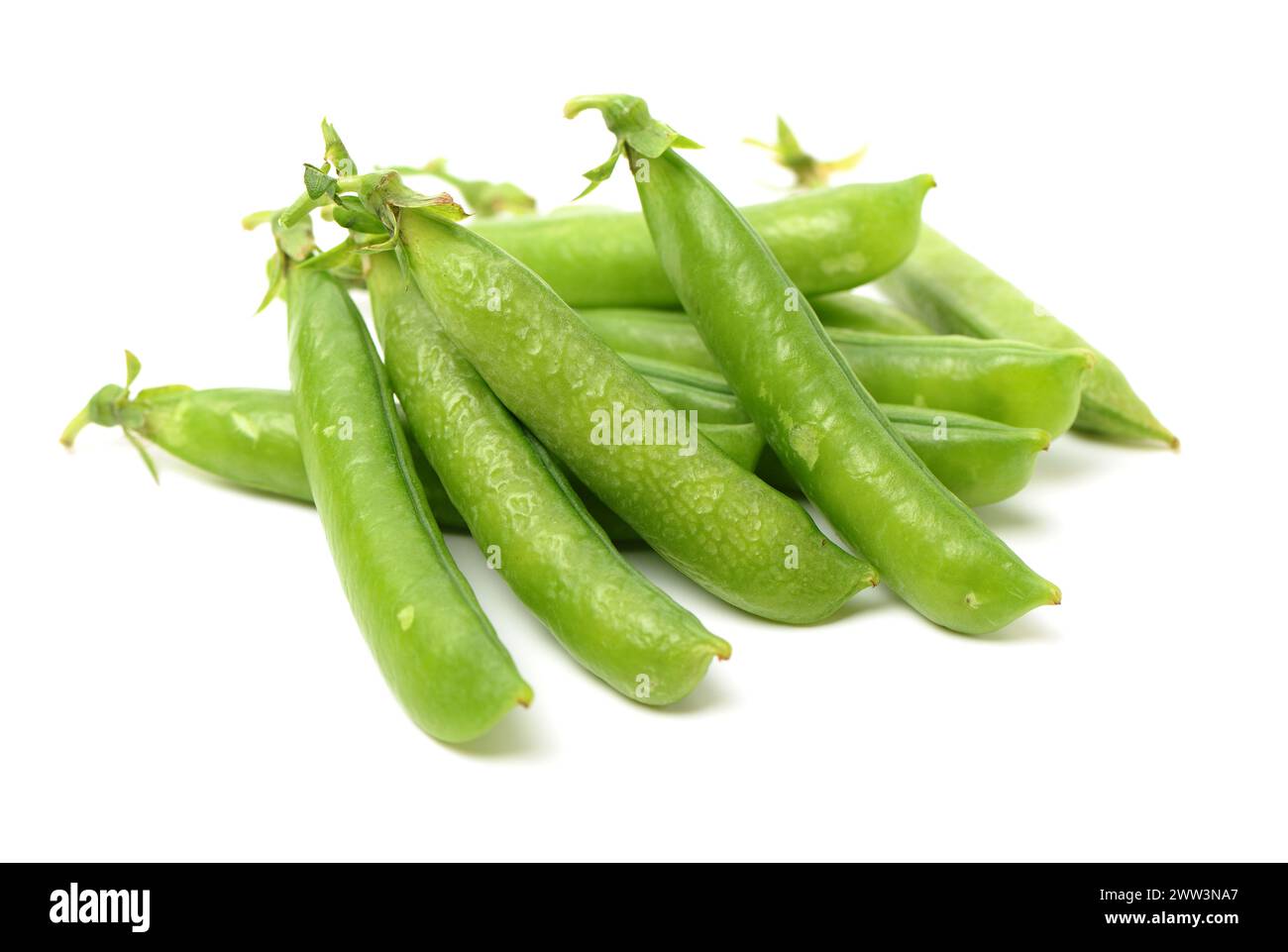Fresh peas isolated on white background Stock Photo - Alamy
