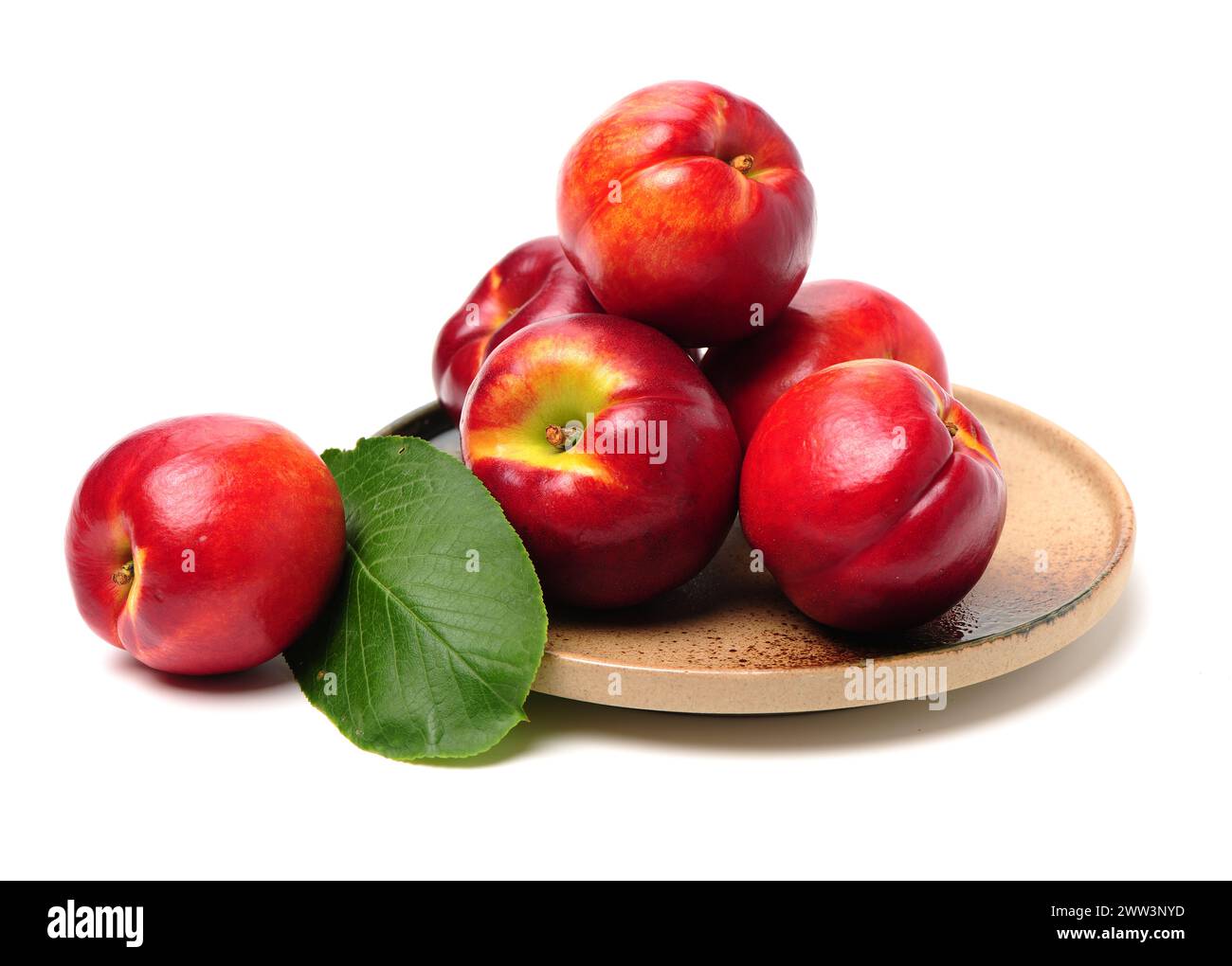 Nectarines on white background Stock Photo - Alamy