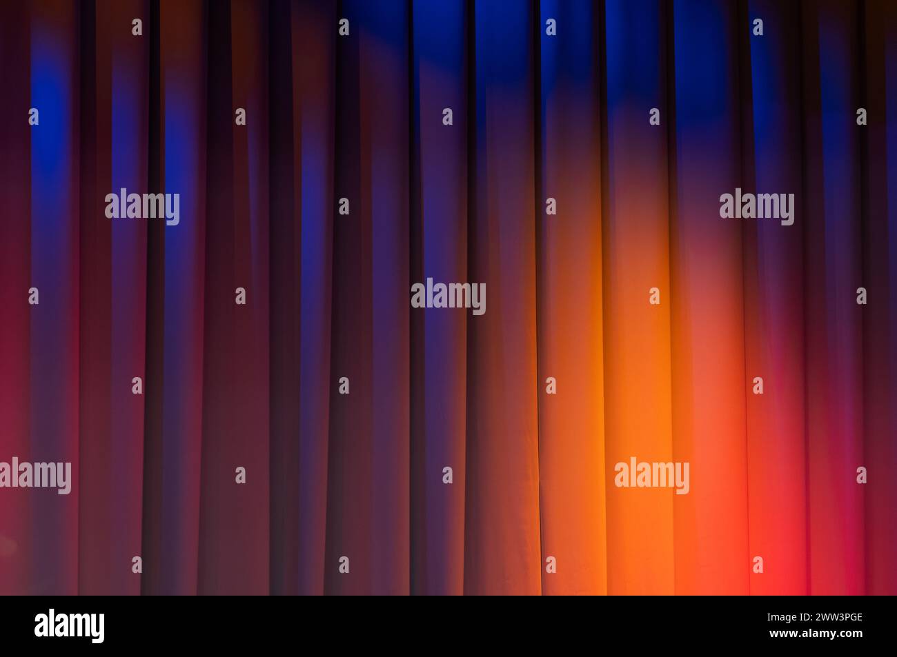 Closed theatrical curtain with colorful spot lights of stage ...