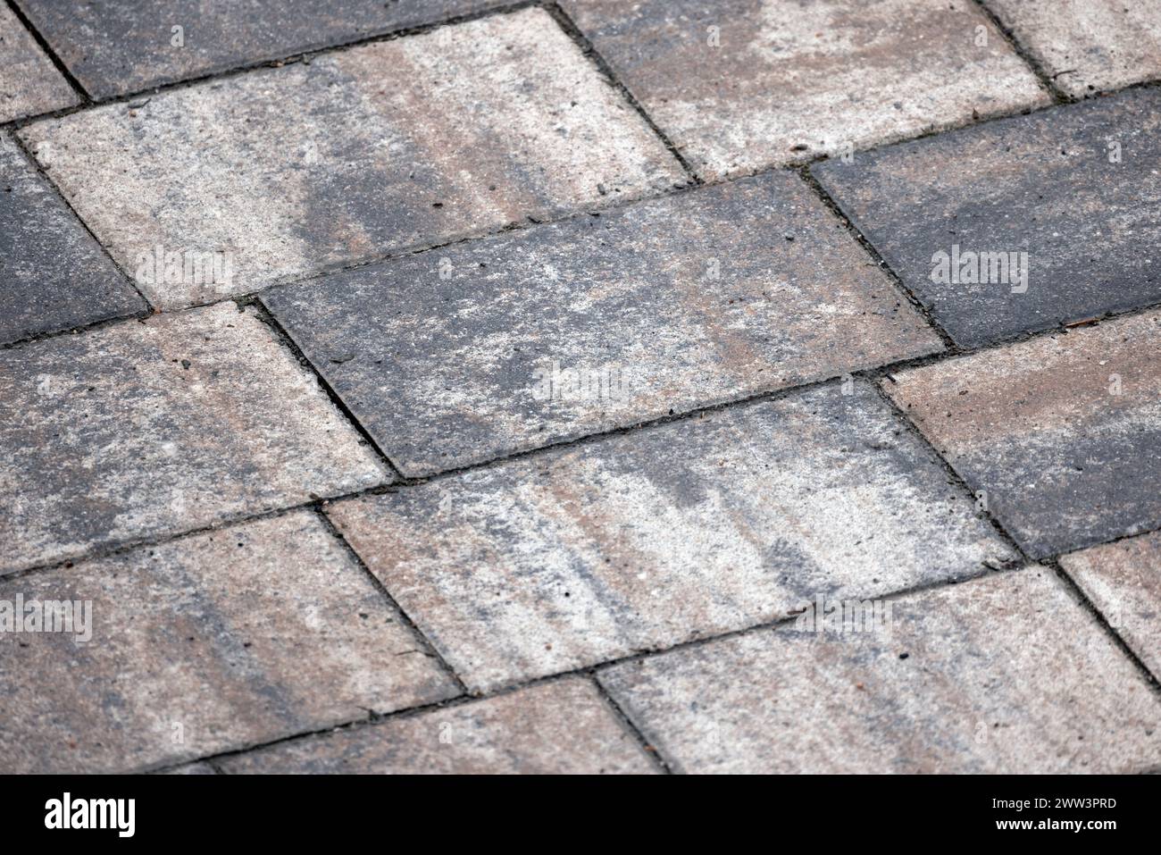 Rough gray cobble road background, paving slabs pattern Stock Photo - Alamy