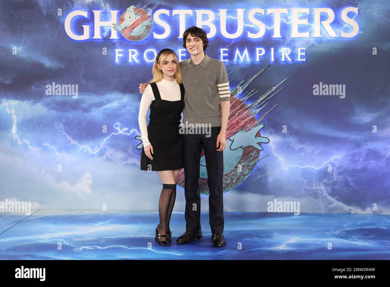 McKenna Grace, left, and Finn Wolfhard pose for photographers at the ...