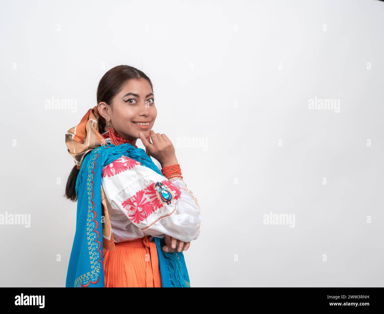 beautiful hispanic girl in cayambe indian costume with arms crossed ...