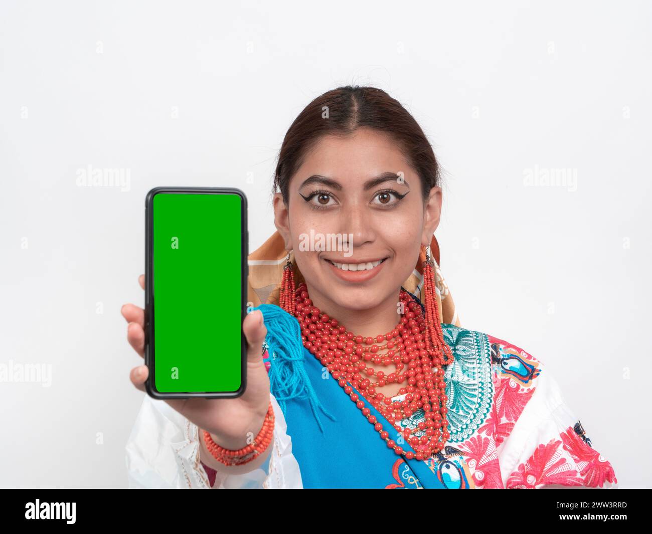 hispanic girl wearing ecuadorian indian costume and showing a cell ...
