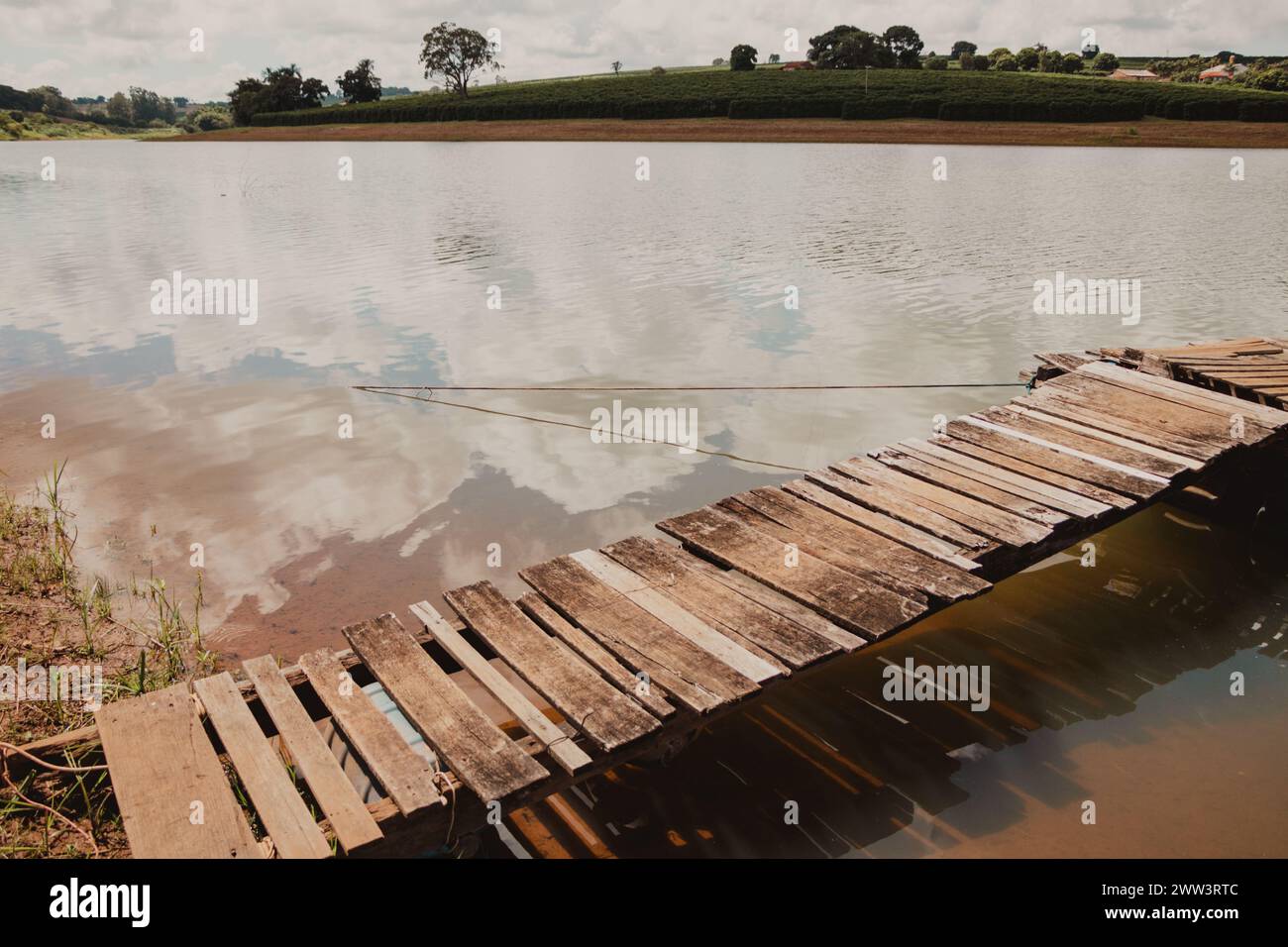 rustic woody bridge at the lake Stock Photo - Alamy