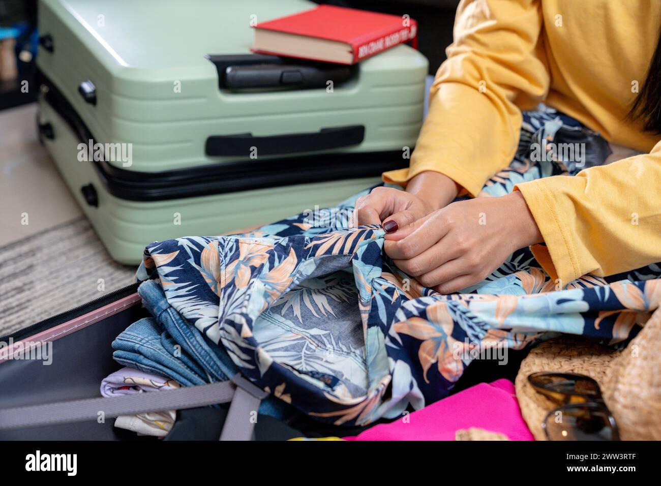 Female preparing for a trip, suitcase long weekend travel Stock Photo ...