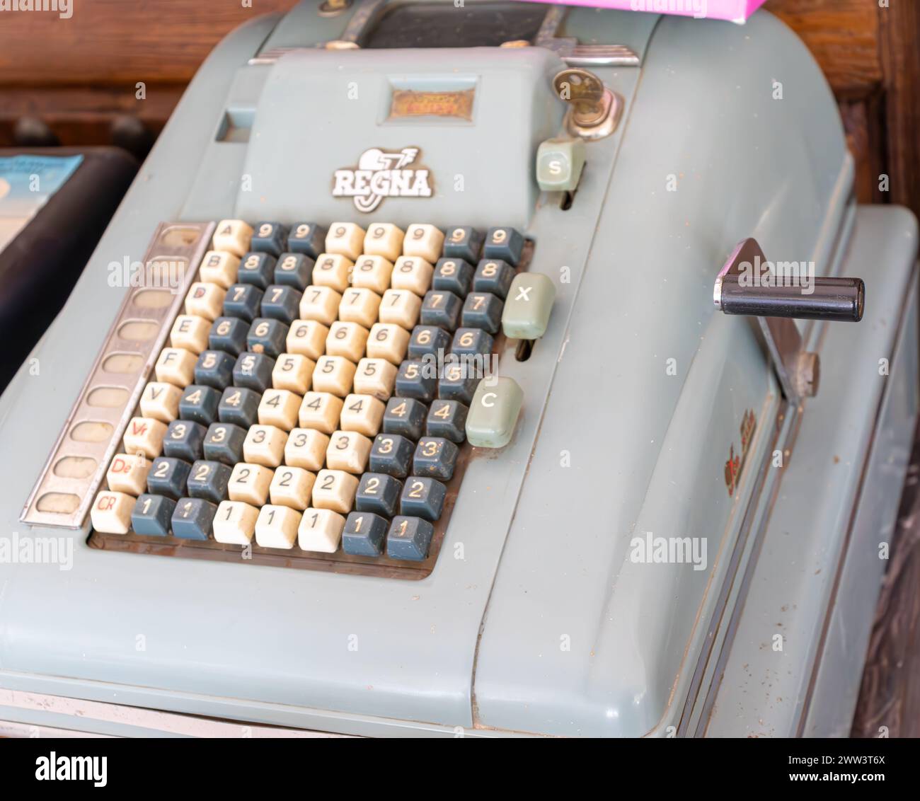cash register from the 50s, gray metal with white and black buttons ...