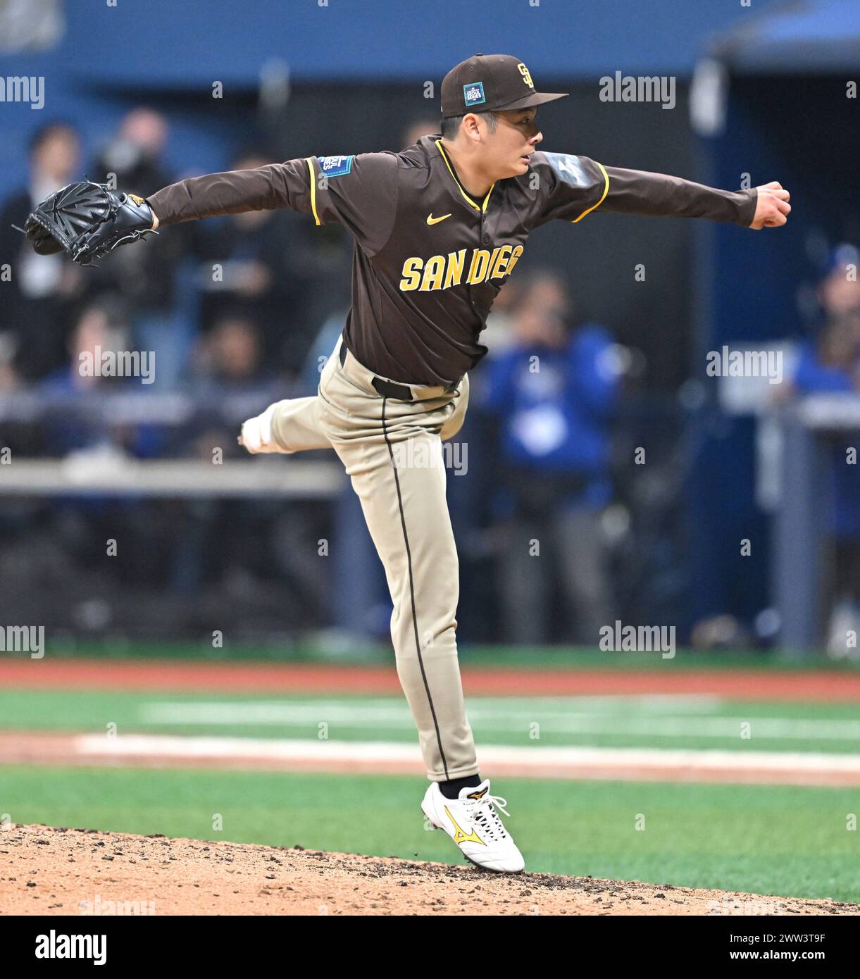 Yuki Matsui of the San Diego Padres throws a ball in the 8th inning of ...