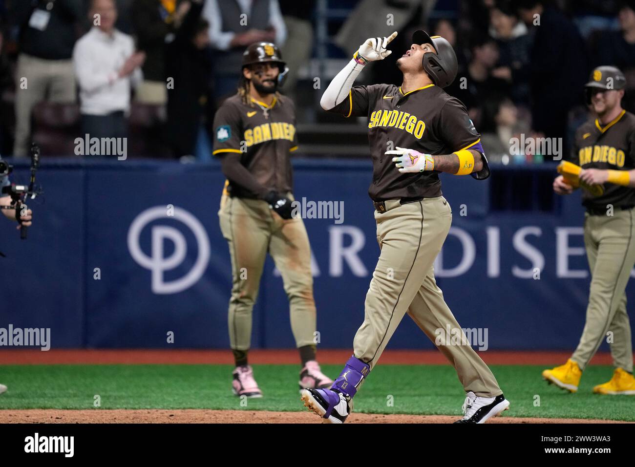 San Diego Padres' Manny Machado scores after hitting a three-run home ...