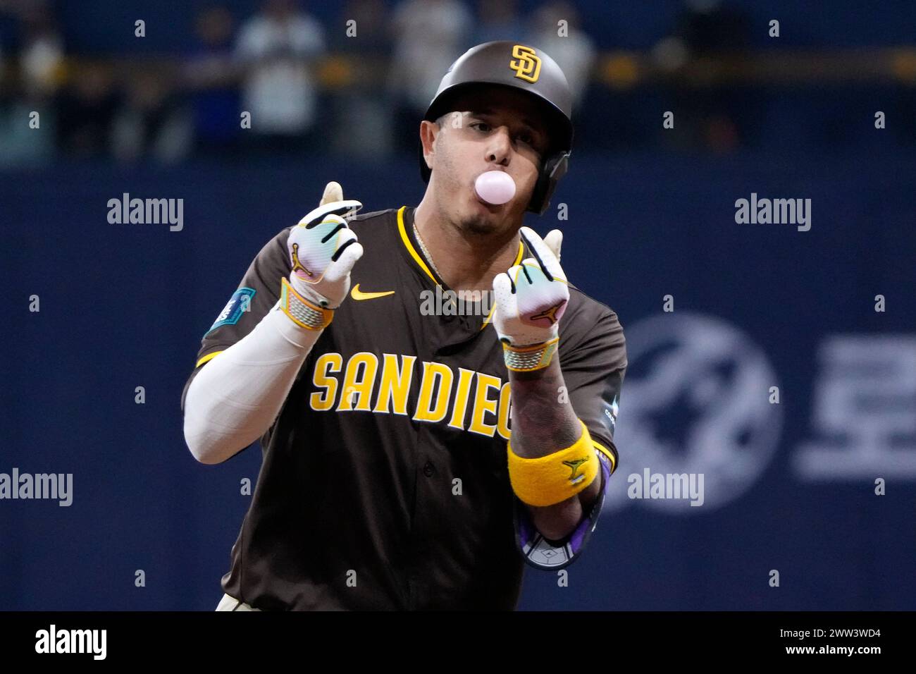 San Diego Padres' Manny Machado gestures as he rounds their after ...