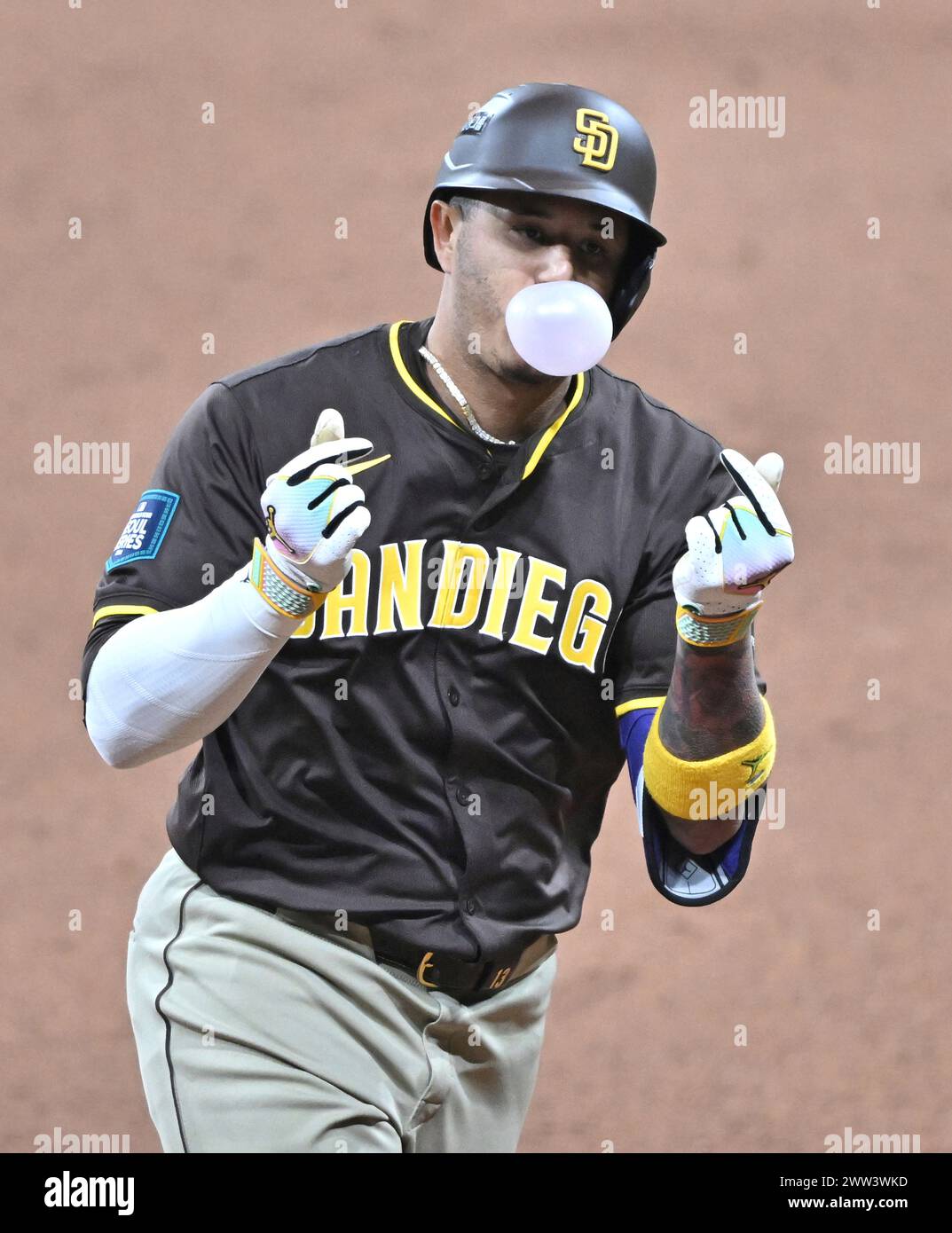 Manny Machado of the San Diego Padres hits a three-run home run in the ...