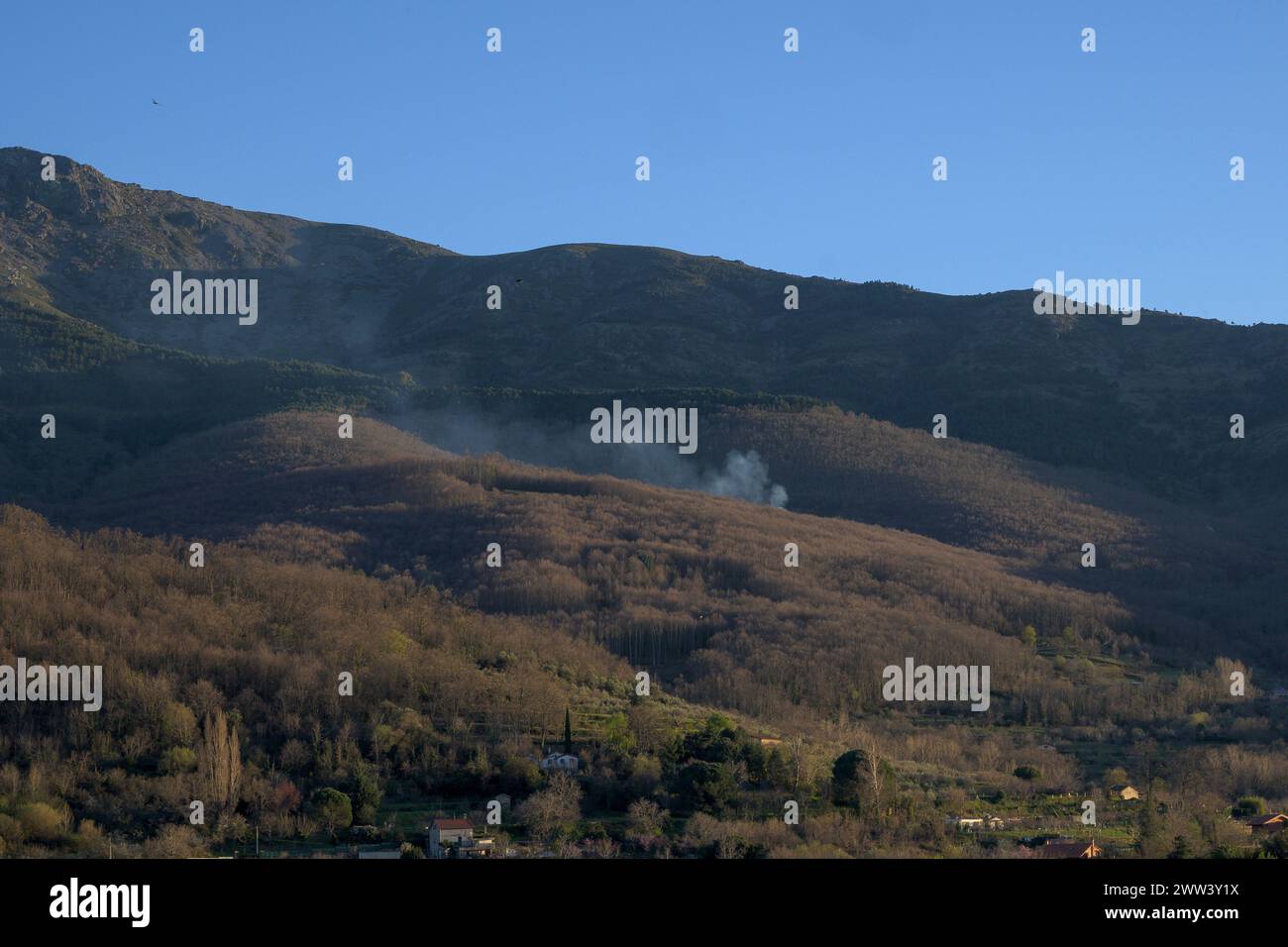 Fire smoke in mountain start of a forest fire horizontally Stock Photo ...