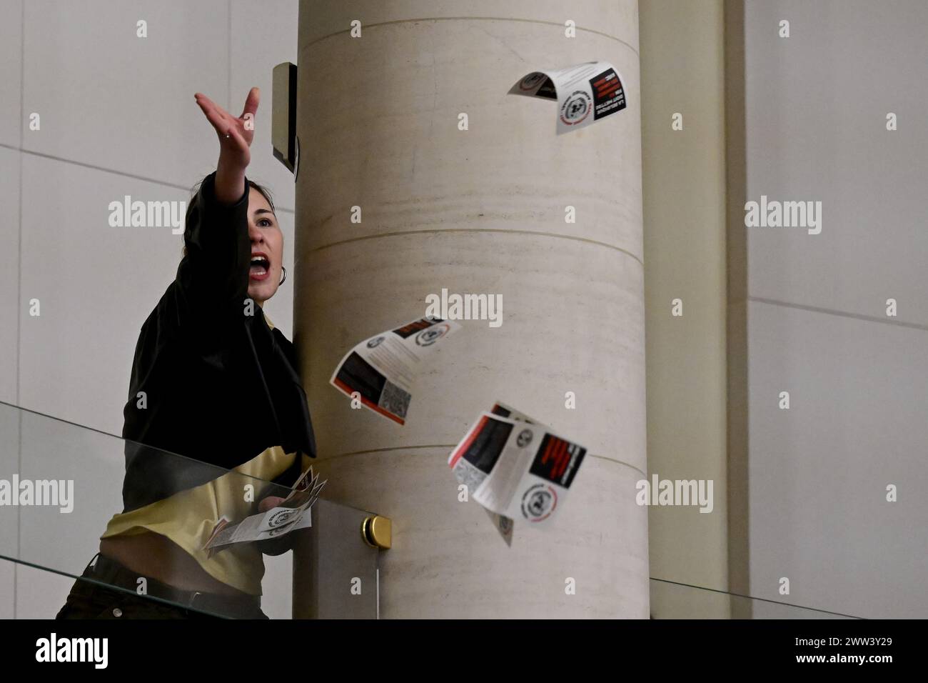 Brussels, Belgium. 21st Mar, 2024. Protesters throw pamphlets from the ...