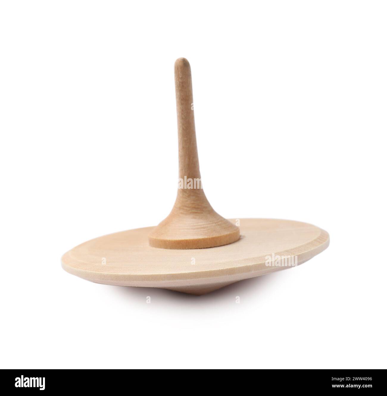 One wooden spinning top isolated on white Stock Photo - Alamy