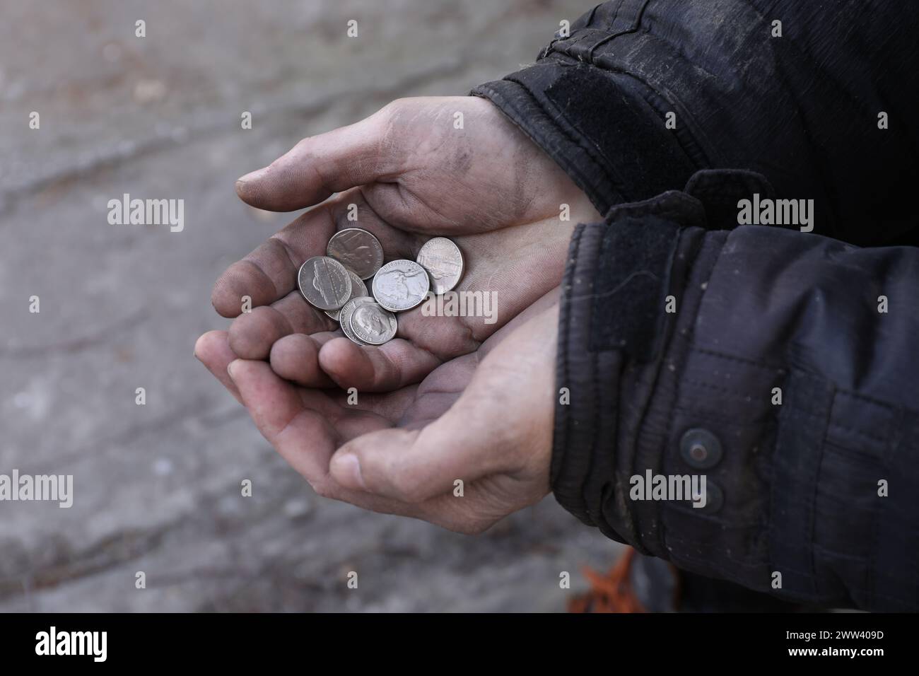 Homeless man counting money hi-res stock photography and images - Alamy