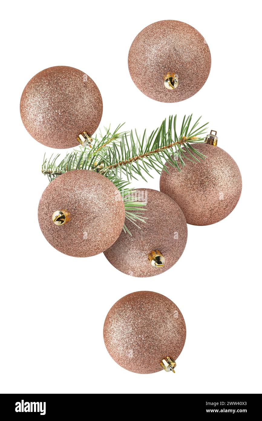 Beautiful Christmas balls and fir tree branches falling on white ...