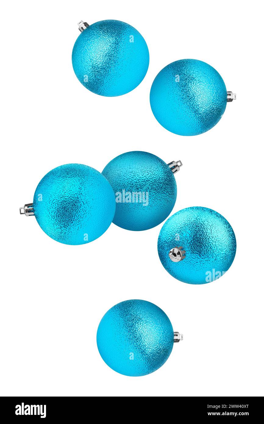 Light blue Christmas balls falling on white background Stock Photo - Alamy