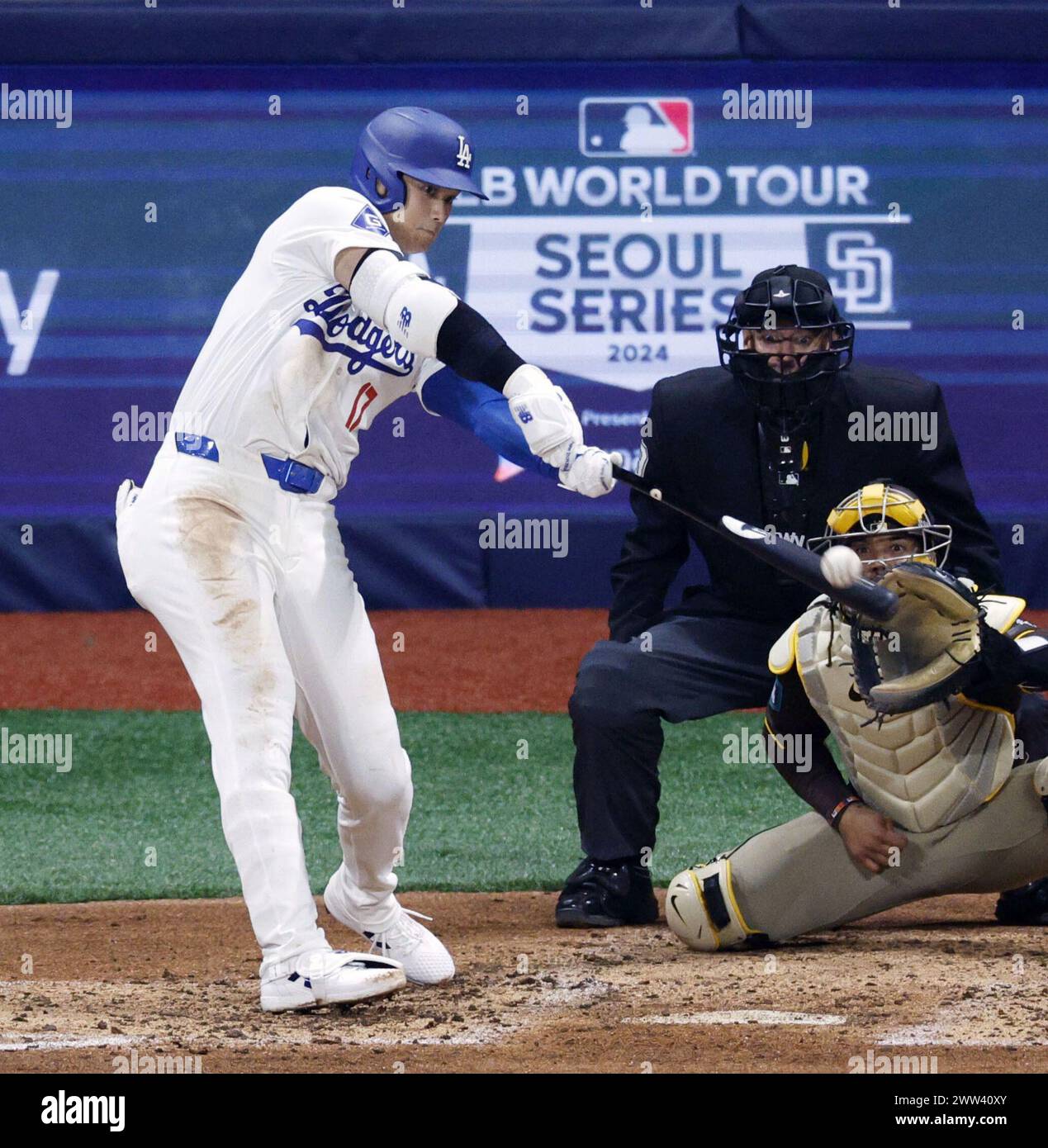 Los Angeles Dodgers designated hitter Shohei Ohtani hits a sacrifice ...
