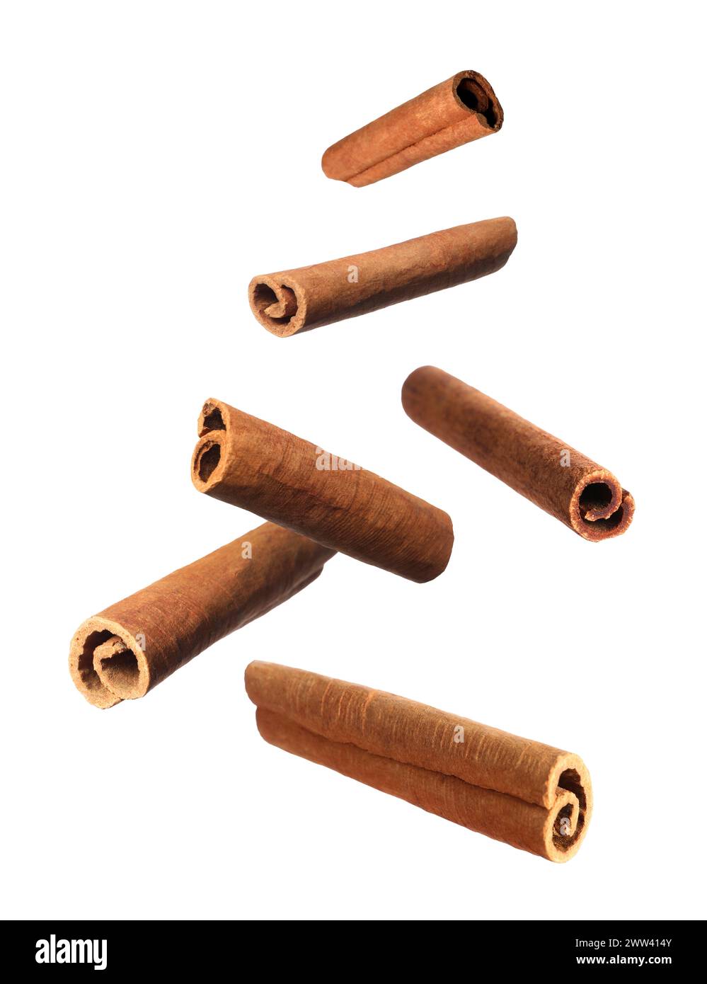 Aromatic dry cinnamon sticks on white background Stock Photo - Alamy