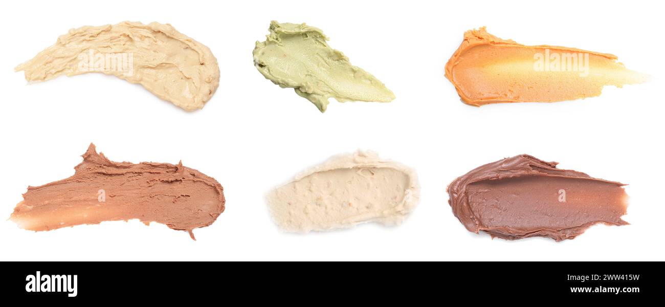Different tasty nut butters isolated on white, top view Stock Photo - Alamy