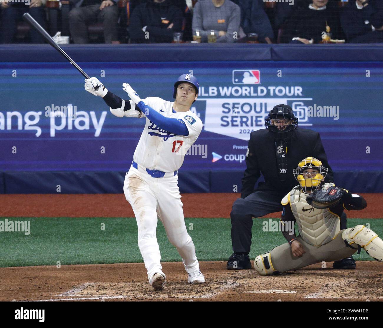 Los Angeles Dodgers designated hitter Shohei Ohtani hits a sacrifice ...