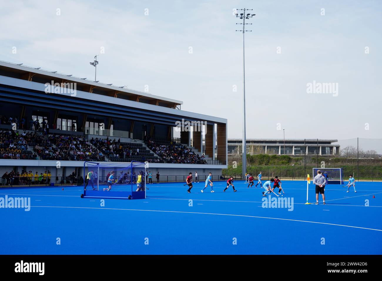 Youths play field hockey, at the renovated Yves-du-Manoir stadium in ...
