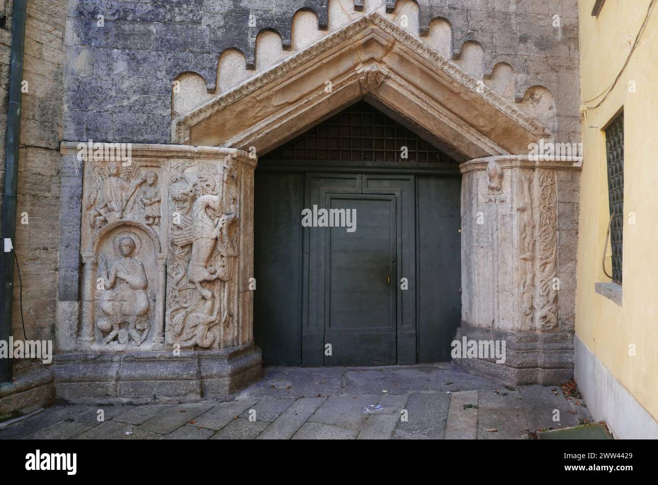 The Basilica di San Fedele in Como, Italy . The North east Gate is ...