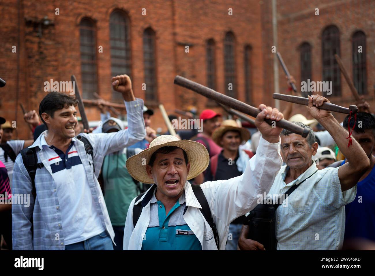 Demonstrators march calling on the government to provide more economic ...