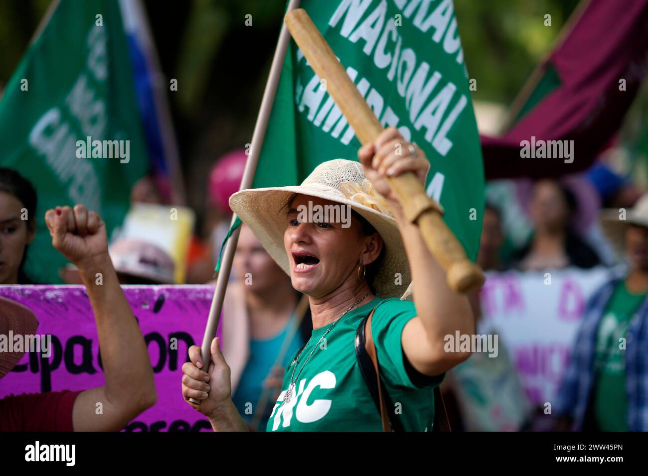 Demonstrators march calling on the government to provide more economic ...