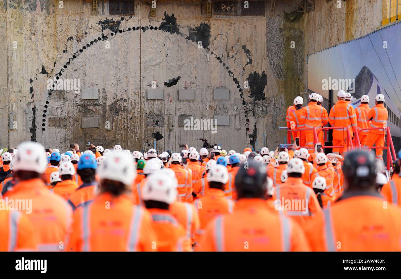 HS2 workers gather around as they await boring machine Cecelia breaking ...