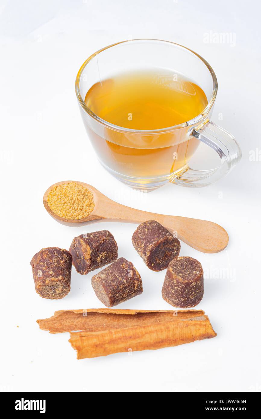 Piloncillo, ground piloncillo and piloncillo tea isolated on white ...