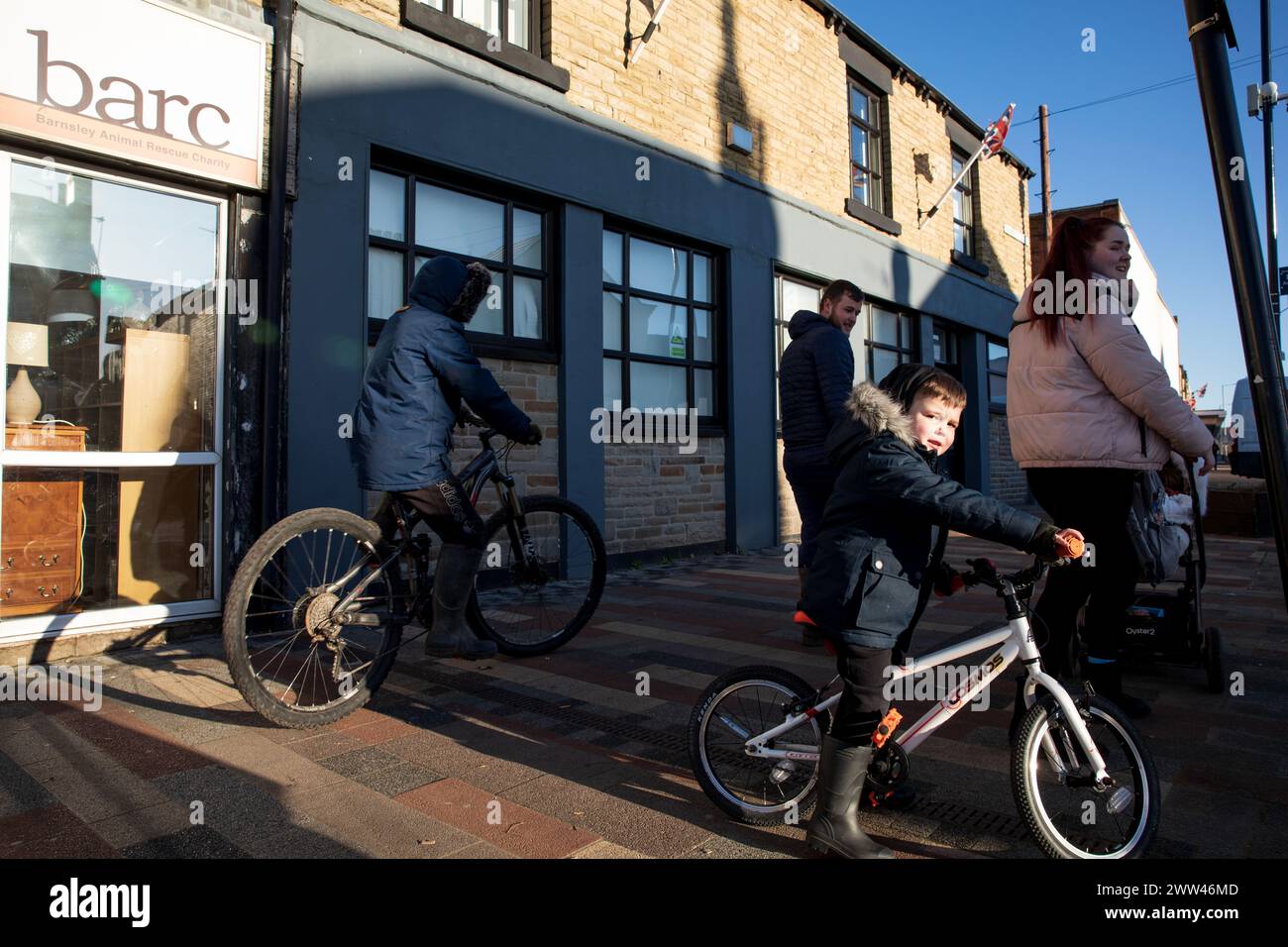 CARTER rides down the high street with his parents. The Ex Mining Town ...