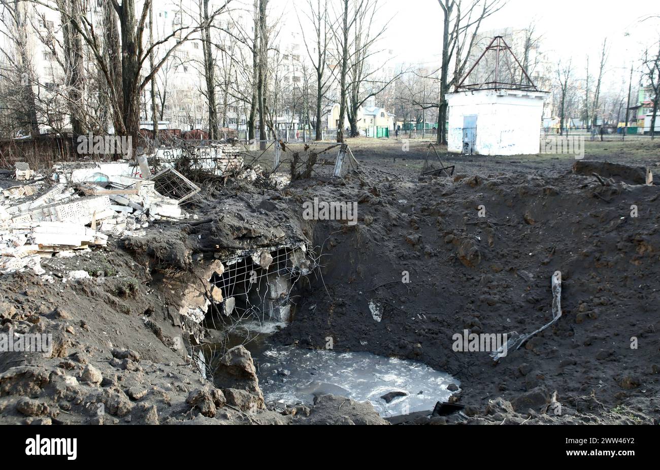 Non Exclusive: KYIV, UKRAINE - MARCH 21, 2024 - A shell crater formed ...