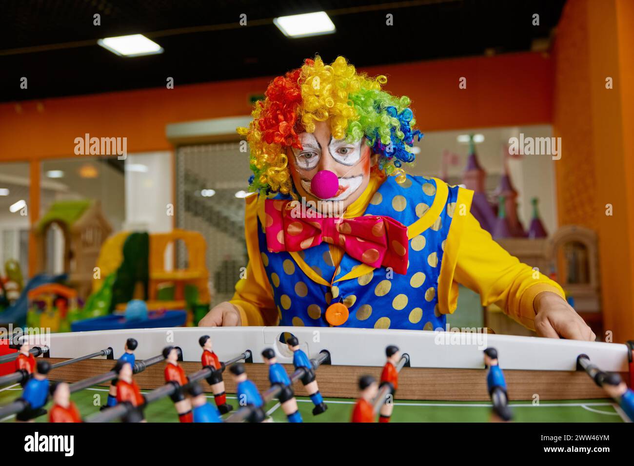 Clown playing football hi-res stock photography and images - Alamy