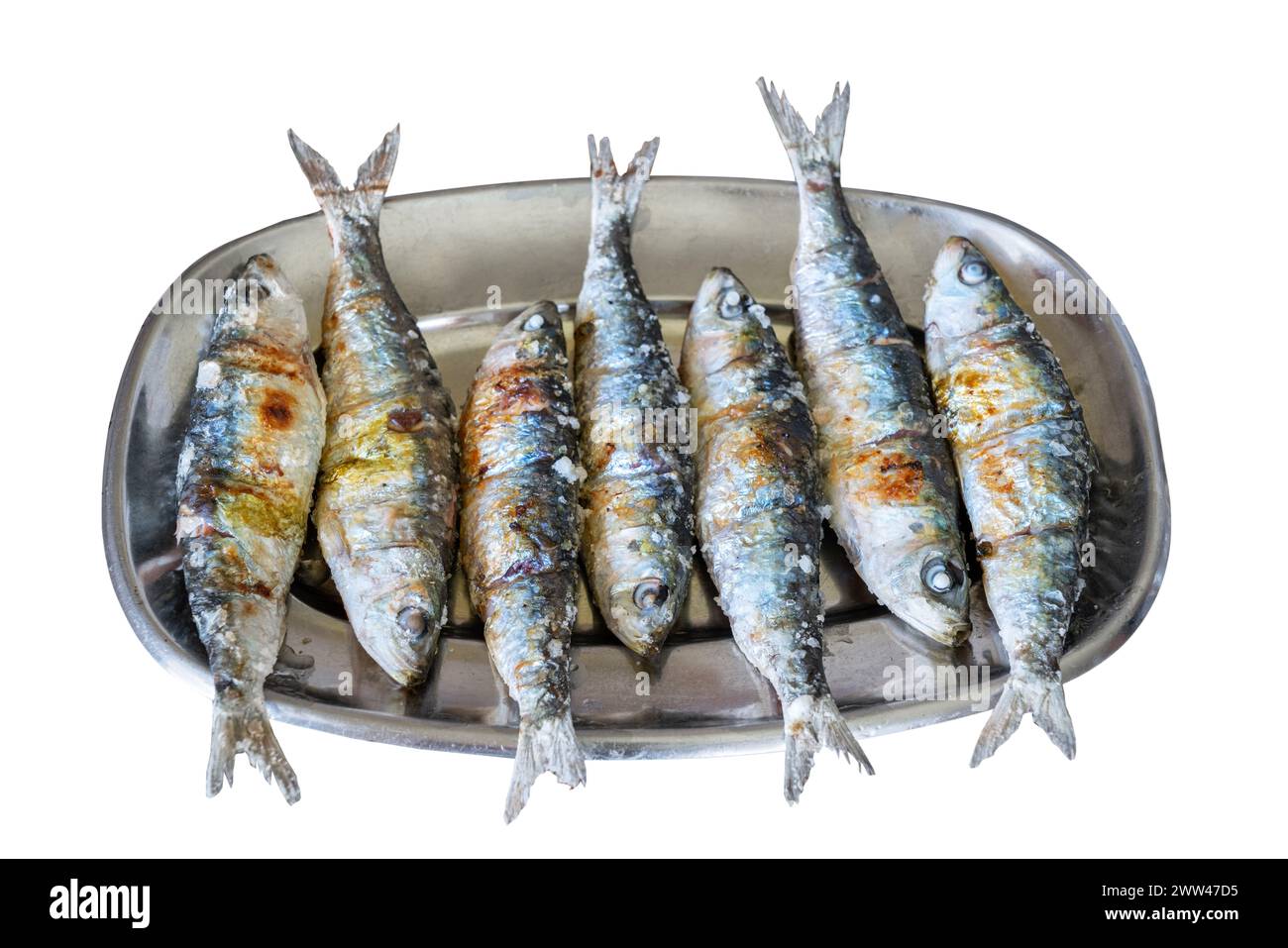 Traditional Portuguese grilled sardines with coarse salt on a metal ...
