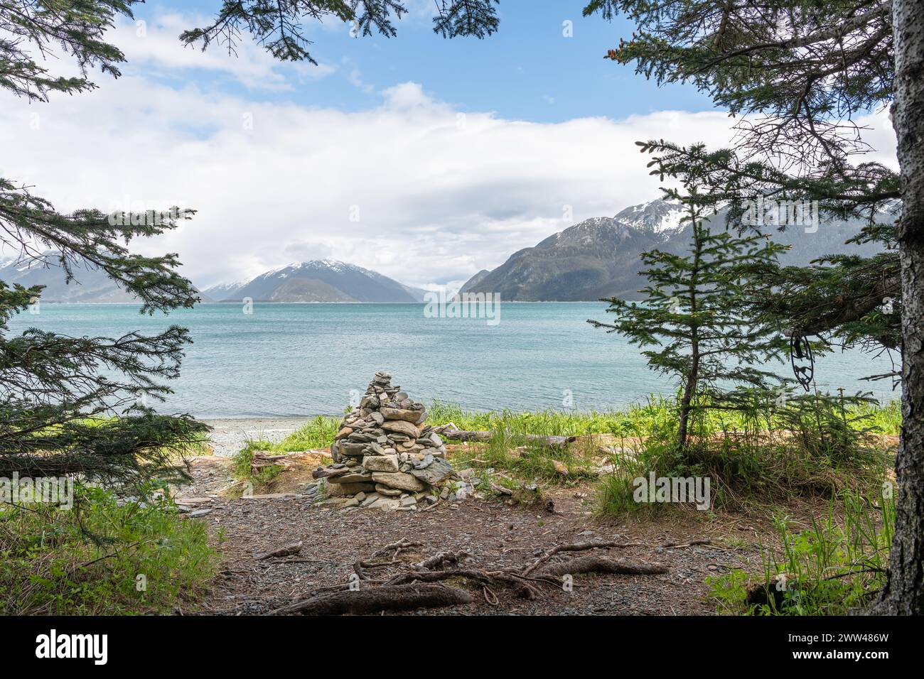Stone cairn at the entrance to the beach overlooking Chilkat Inlet from ...