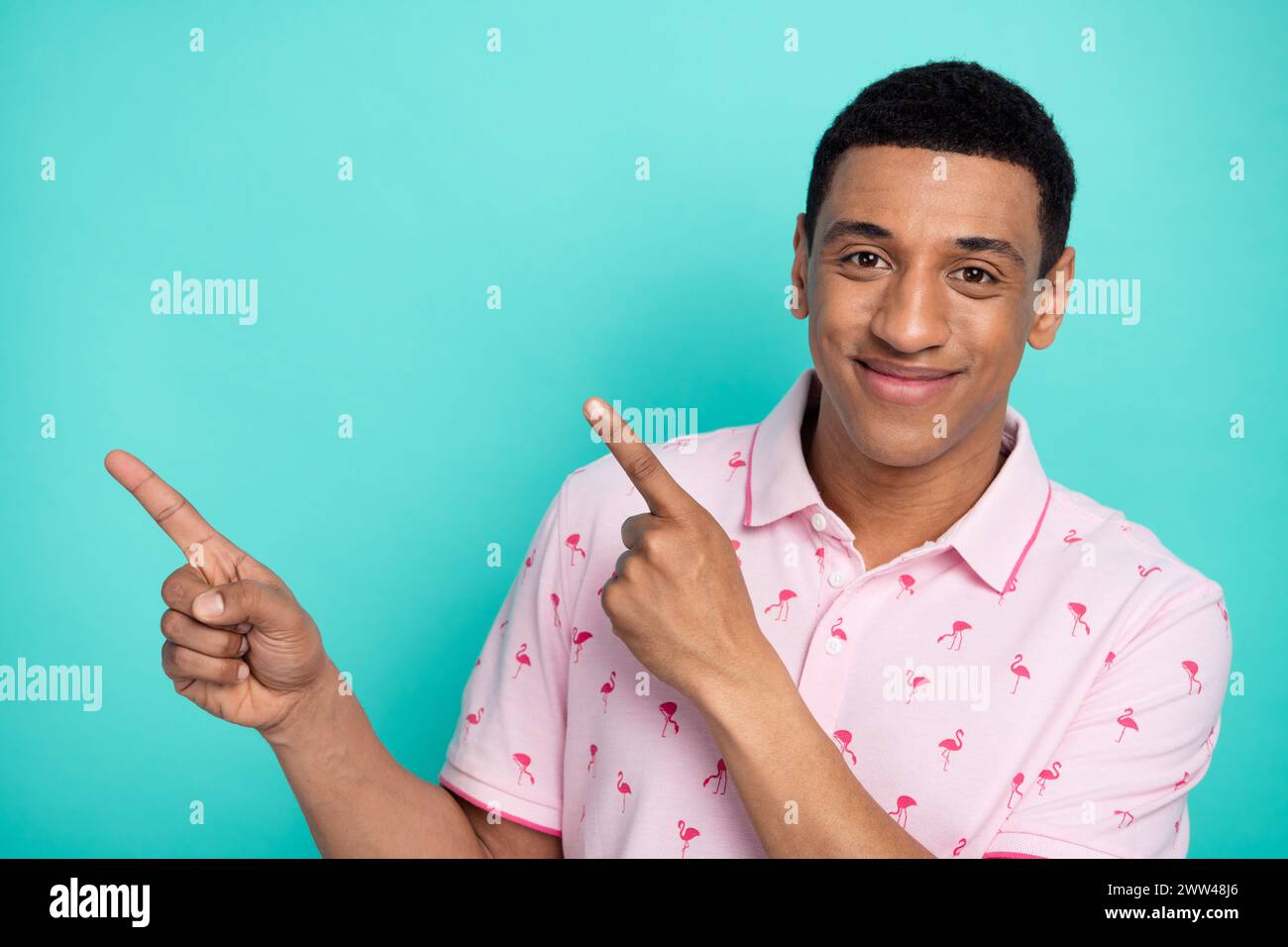 Photo of friendly positive person indicate fingers empty space novelty ...