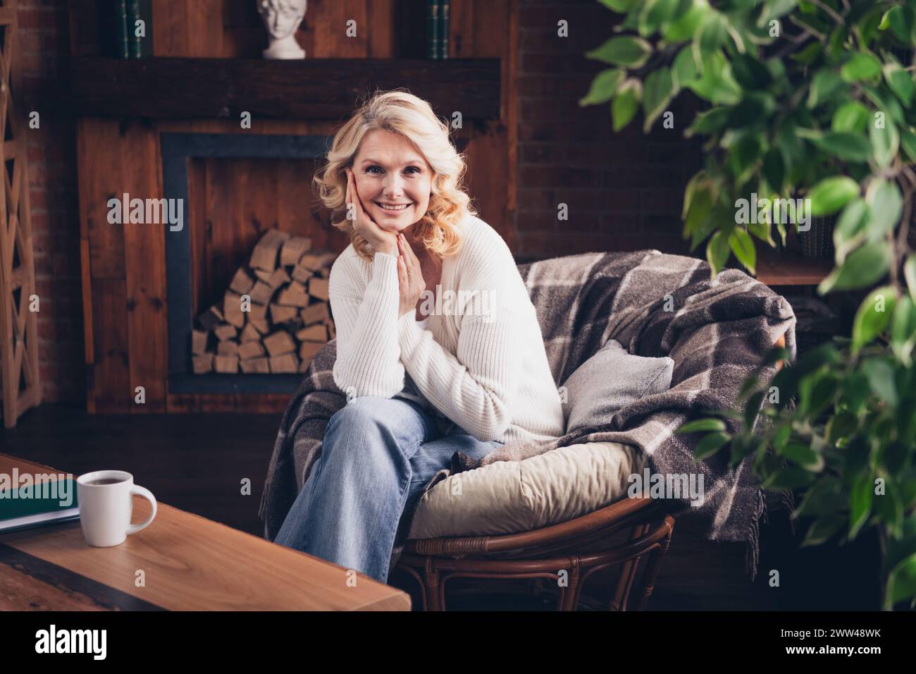 Photo portrait of lovely retired woman sit armchair have rest dressed ...