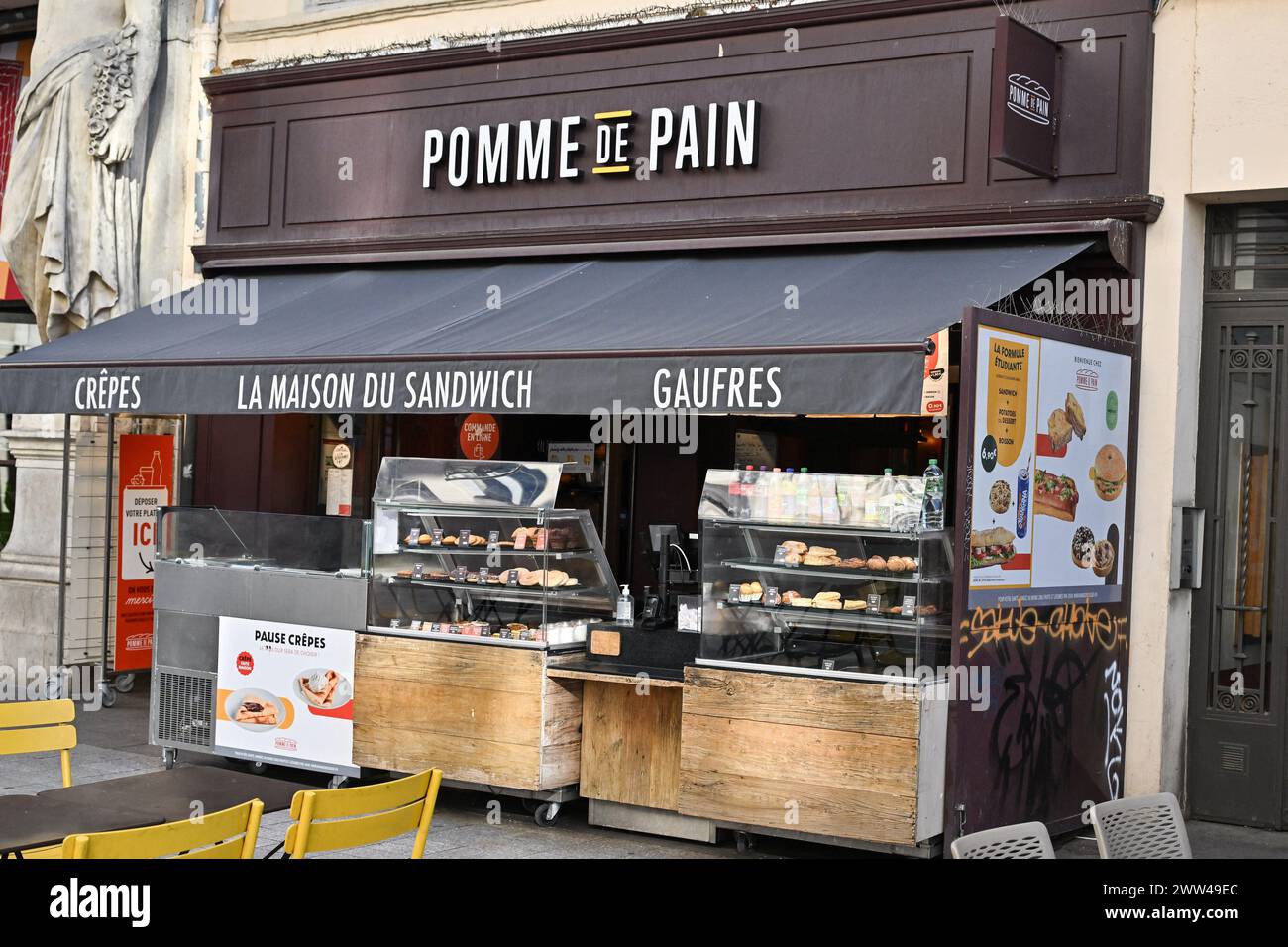 Pomme de Pain Illustration of commercial signs and shops in Lyon ...
