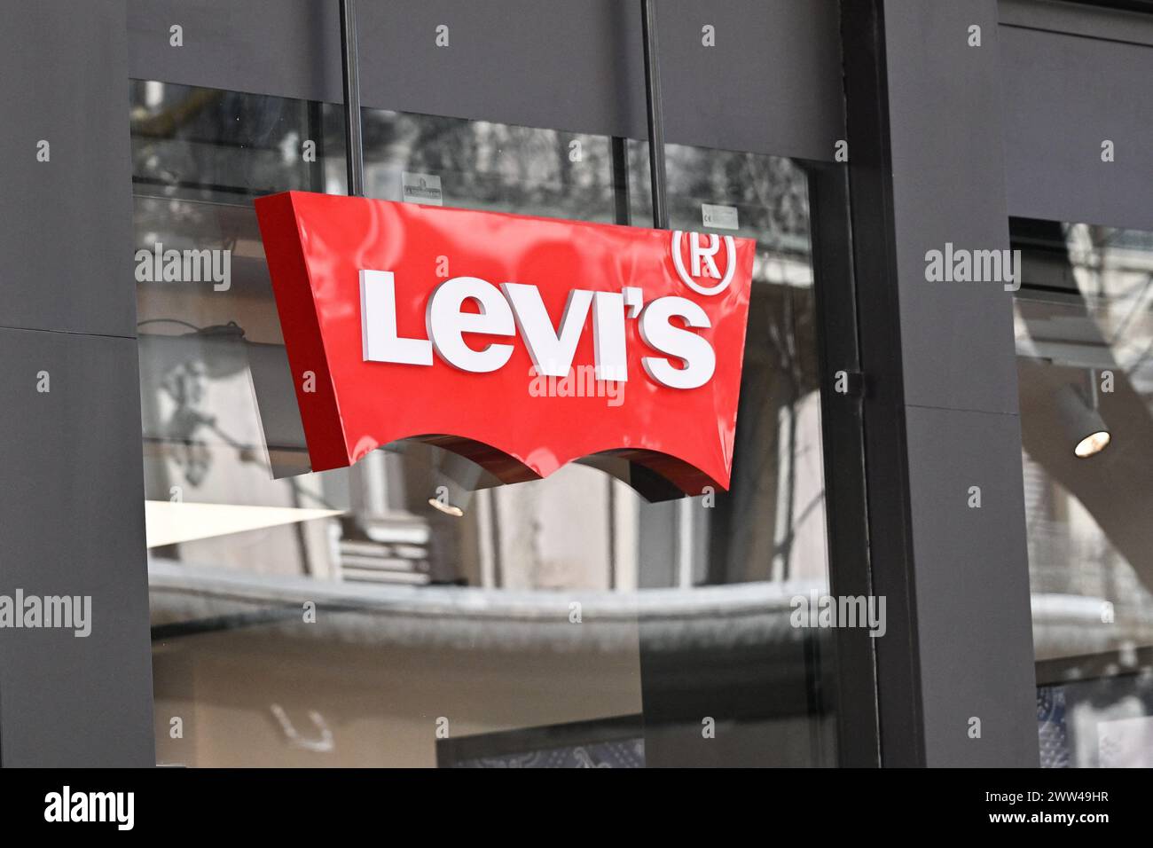 Levis Illustration of commercial signs and shops in Lyon, France on ...