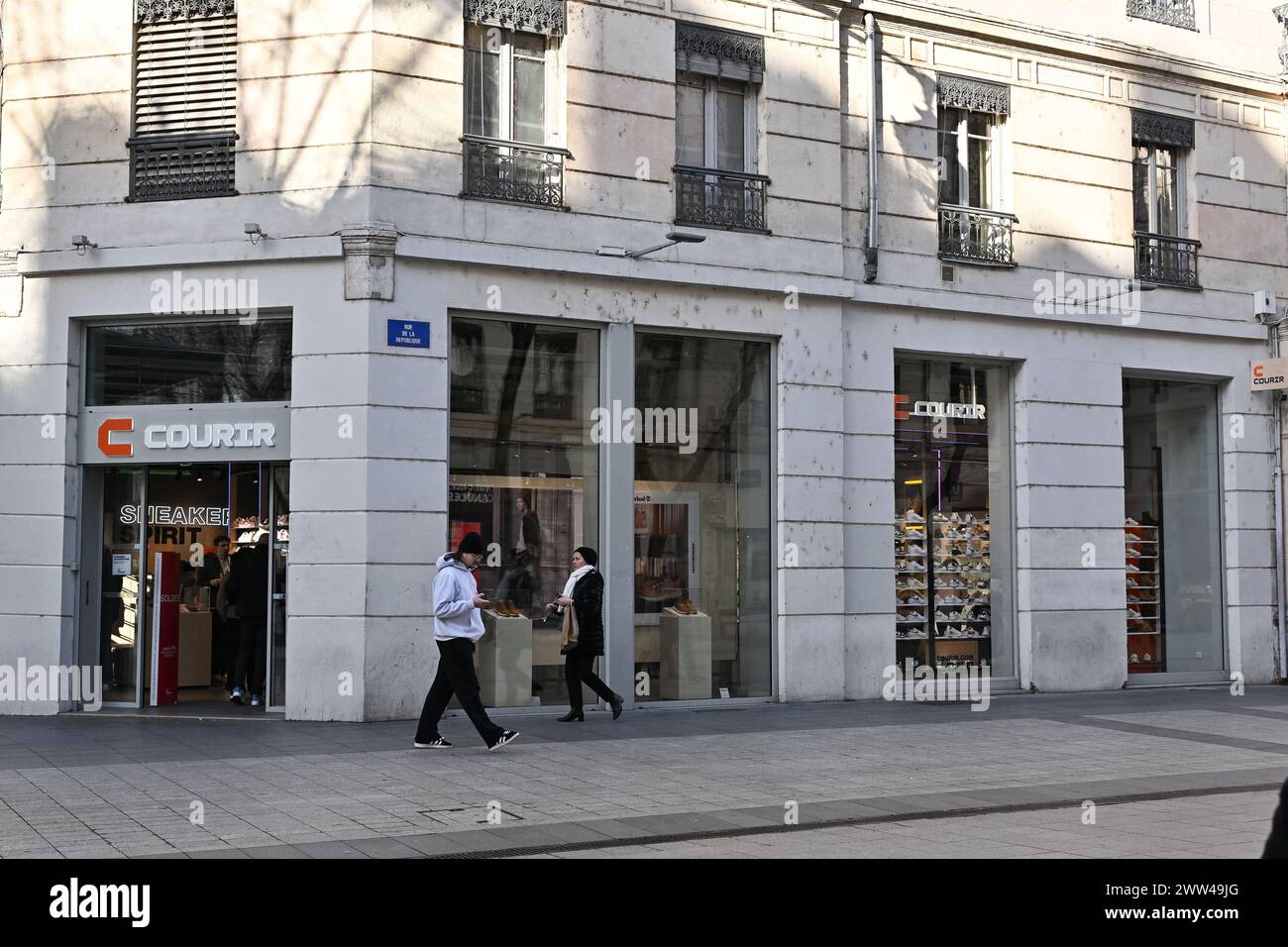 Courir Illustration of commercial signs and shops in Lyon, France on ...