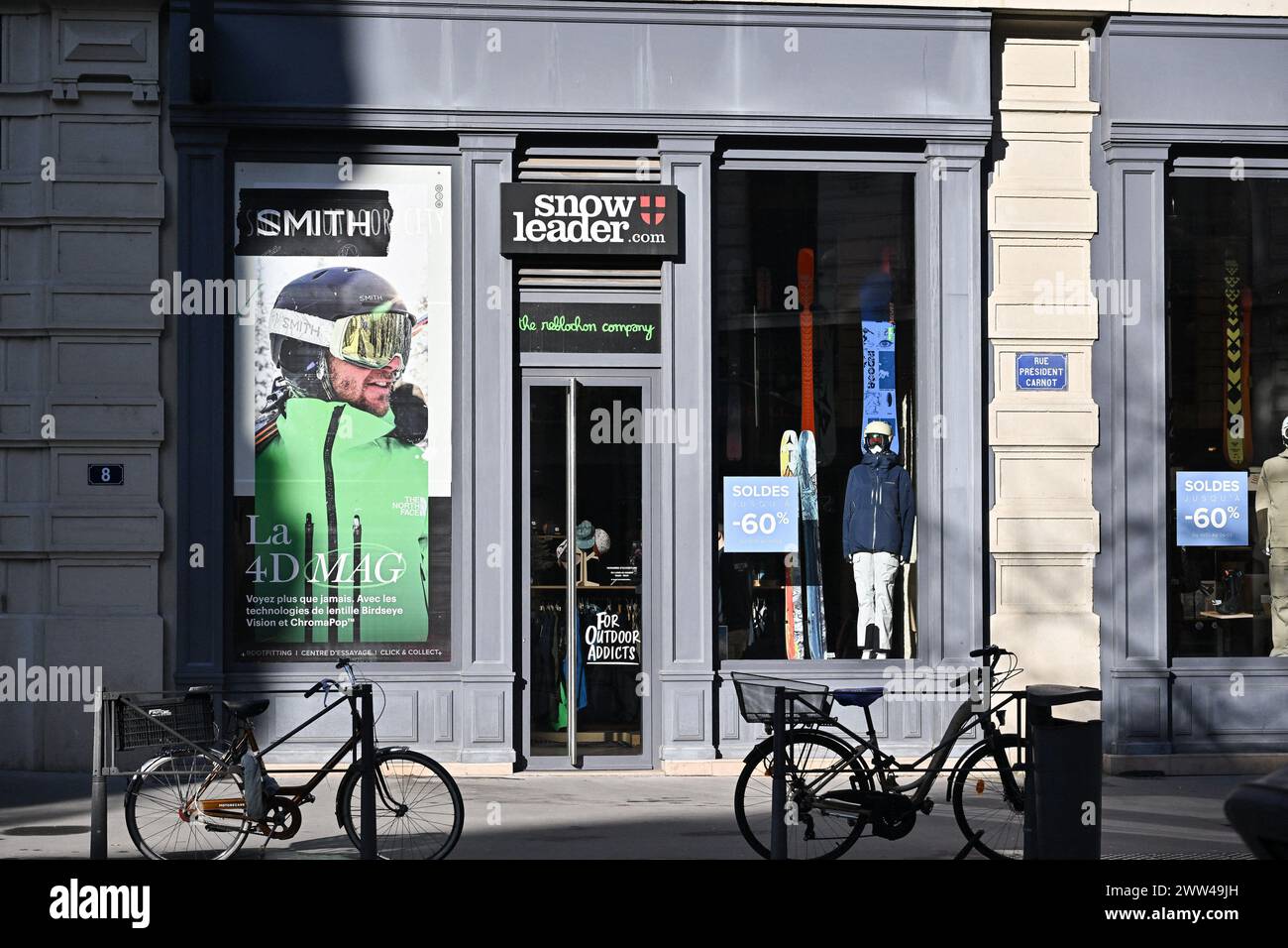 Snow Leader Illustration of commercial signs and shops in Lyon, France ...