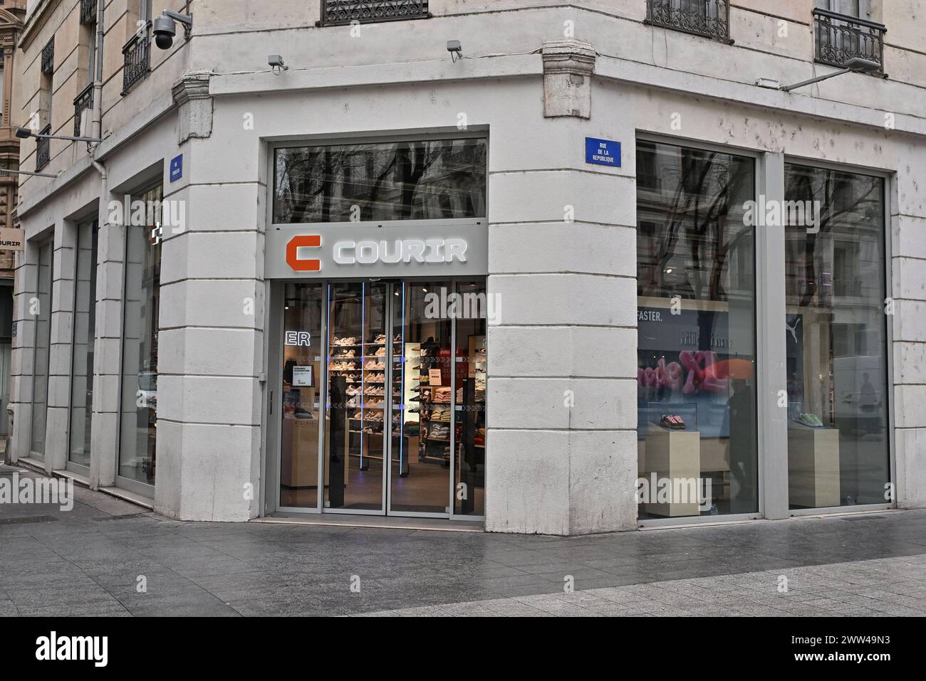 Courir Illustration of commercial signs and shops in Lyon, France on ...