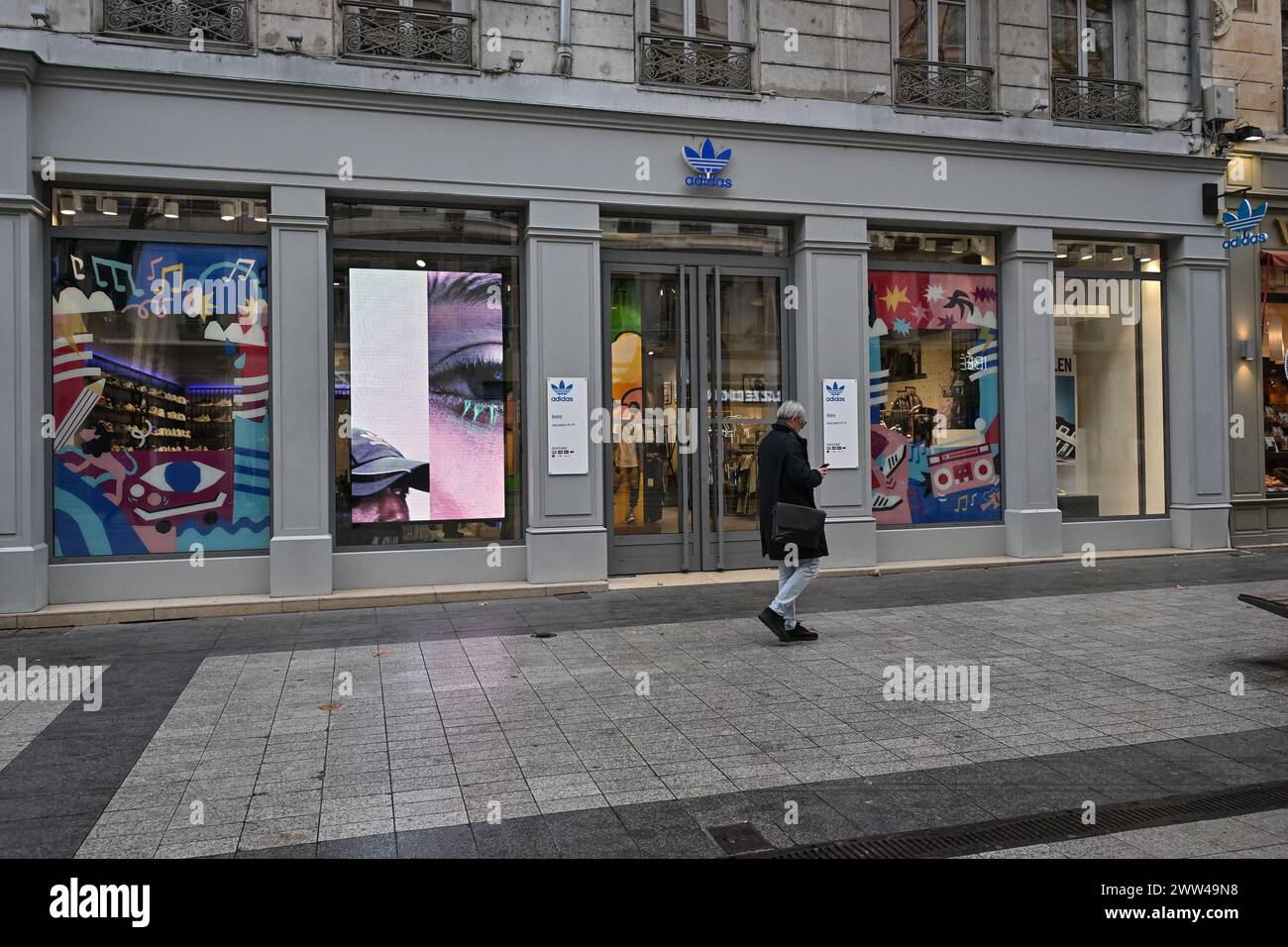Adidas Illustration of commercial signs and shops in Lyon, France on ...