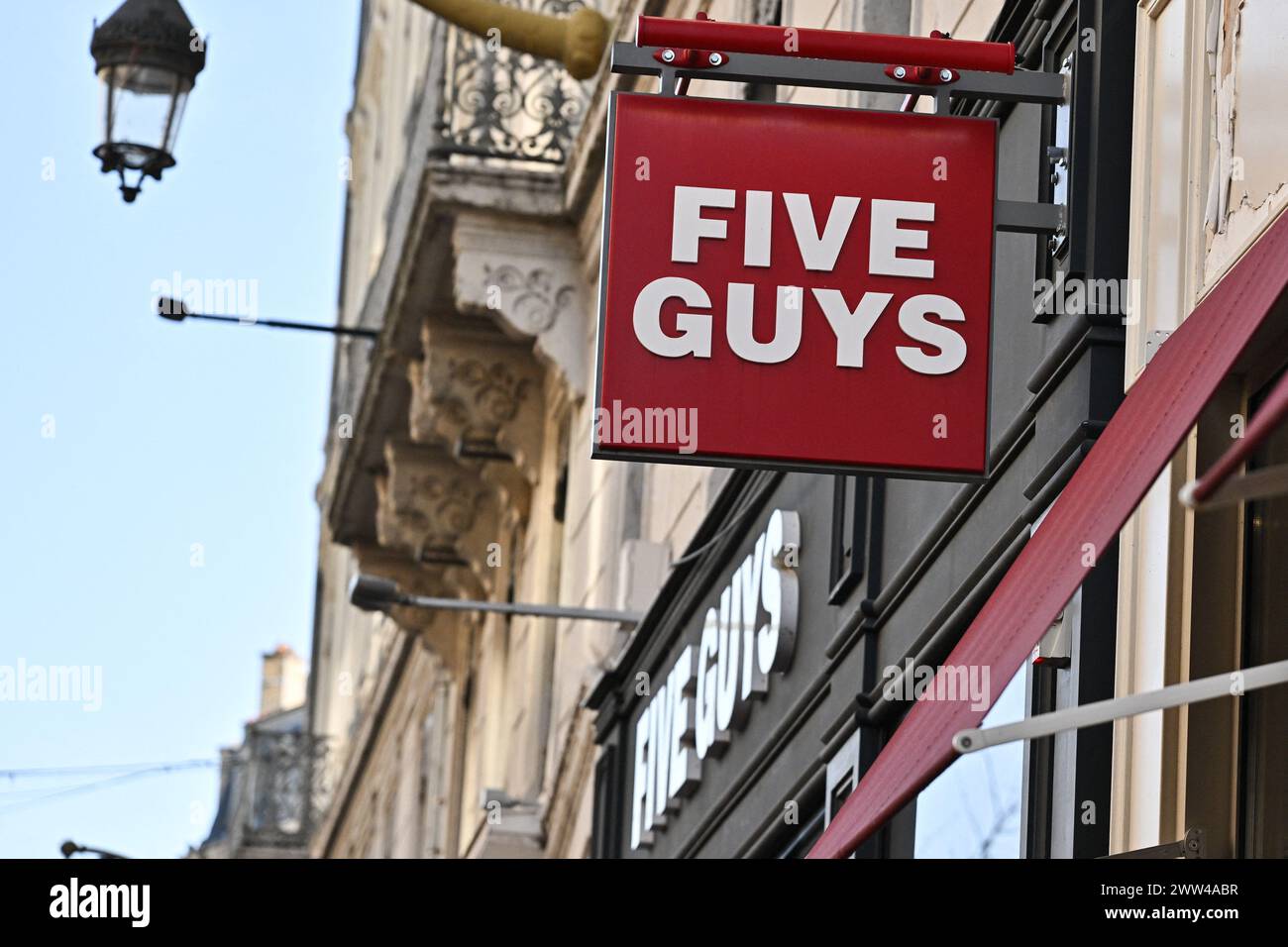 Five Guys Illustration of commercial signs and shops in Lyon, France on ...