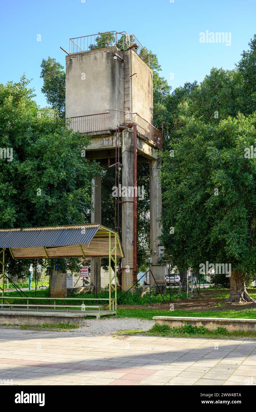 Concrete water tower in The Great Courtyard of Merhavia. Merhavia, the ...