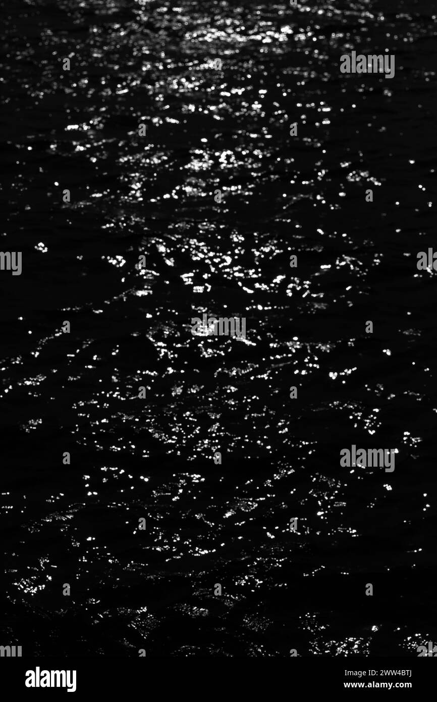 Sun rays, reflecting on sea surface Stock Photo - Alamy